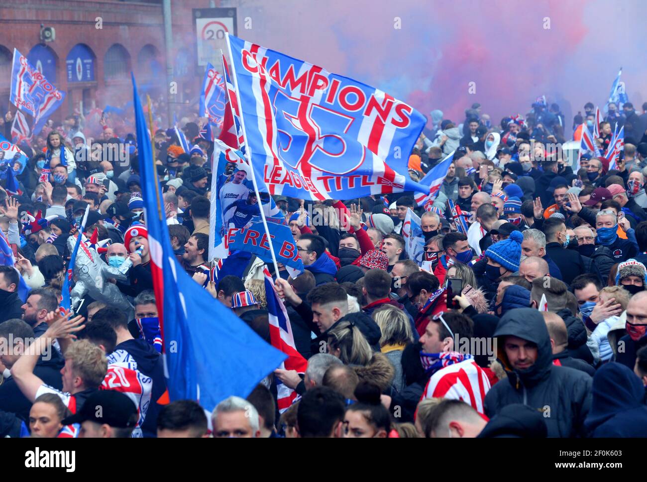Rangers fans celebrate outside of the Ibrox Stadium after Rangers win ...