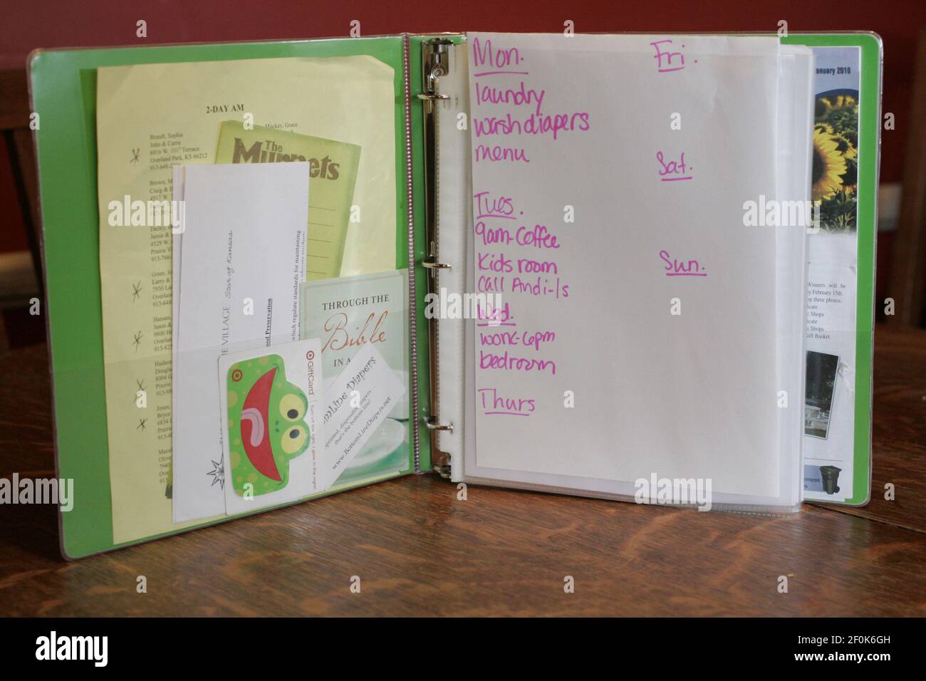Kerri Bell-Jones of Prairie Village, Kansas, uses a binder notebook to ...
