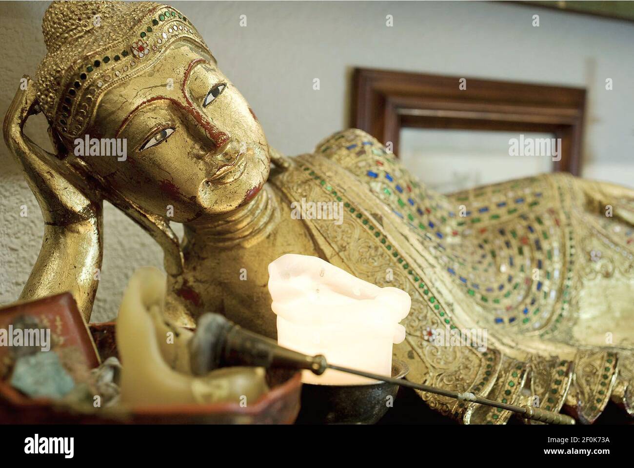 A reclining Buddha from Thailand at the home of Gary and Melinda ...