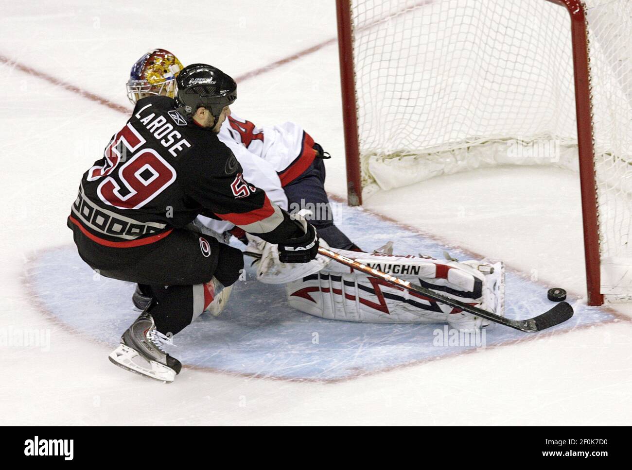 The Carolina Hurricanes' Chad LaRose (59) puts the puck past the ...