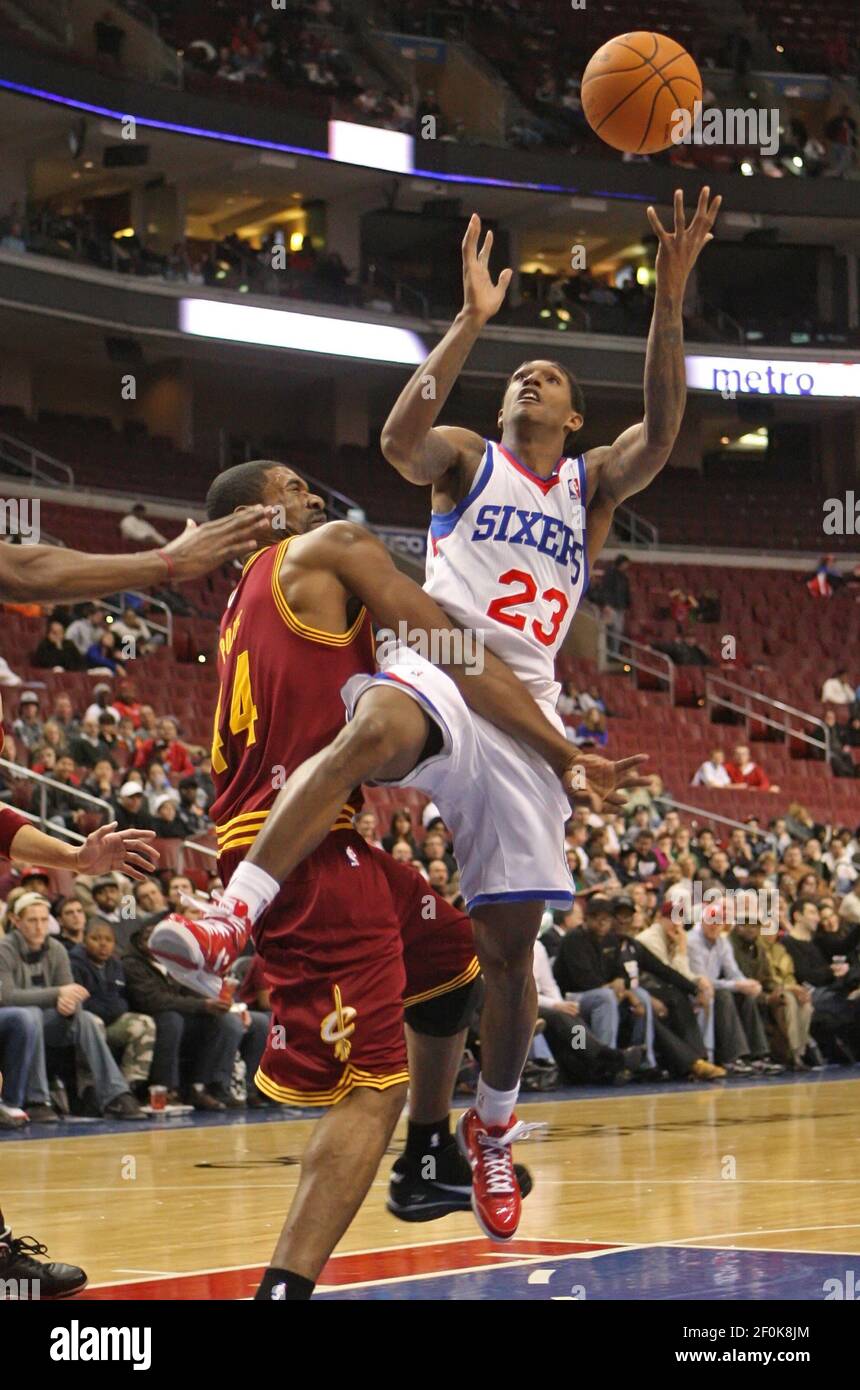 Lou Williams of the Philadelphia 76ers is grabbed by Leon Powe of the ...