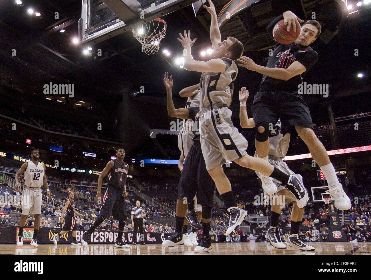 Texas Tech forward Darko Cohadarevic (31) snags a rebound from Colorado ...