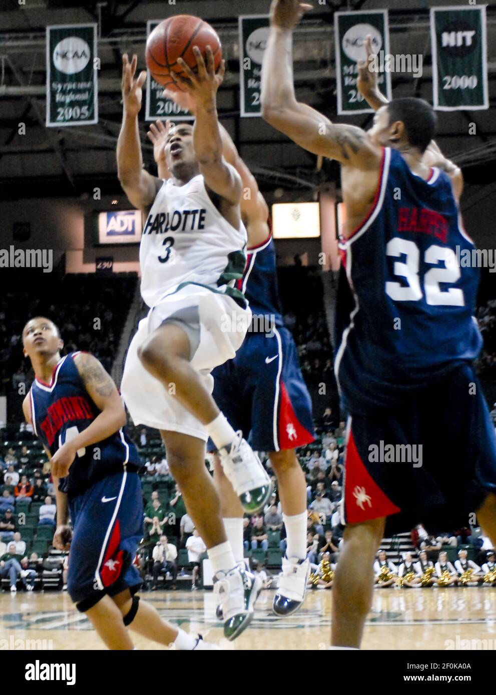 Charlotte guard Dijuan Harris (3) drives to the hoop past Richmond ...