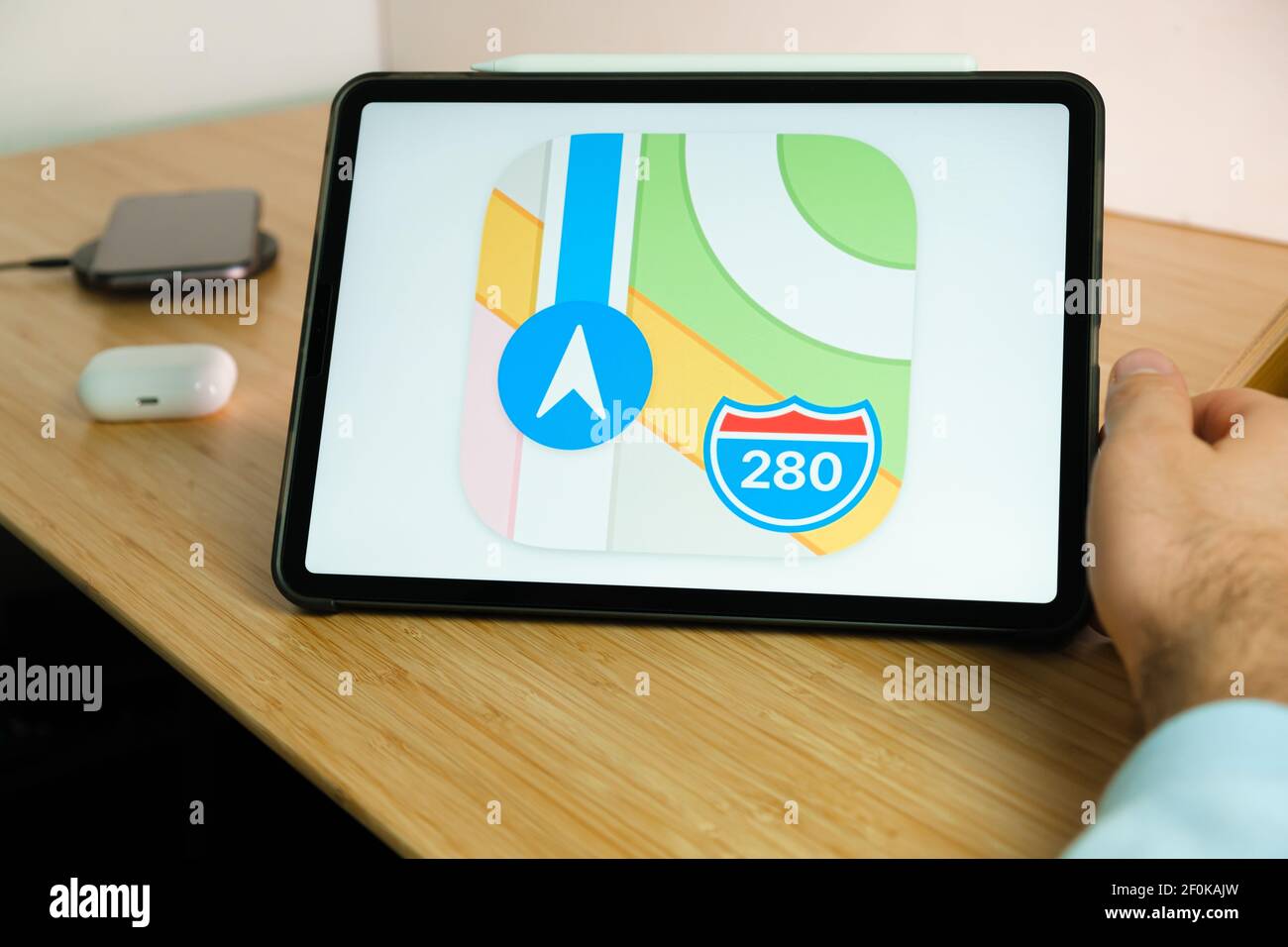 Apple Maps logo on the screen of iPad tablet. March 2021, San Francisco ...