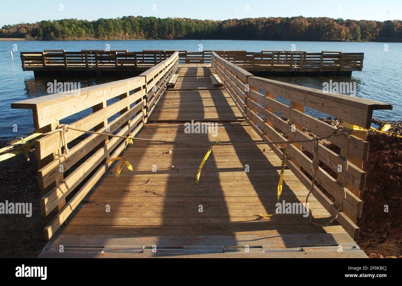 A black sealant sprayed on parking lots, driveways and playgrounds ...