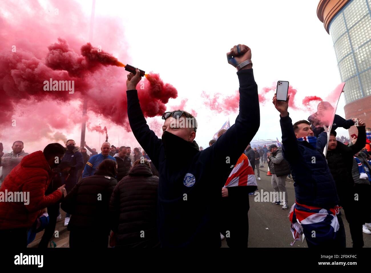 Rangers fans celebrate outside of the Ibrox Stadium after Rangers win ...