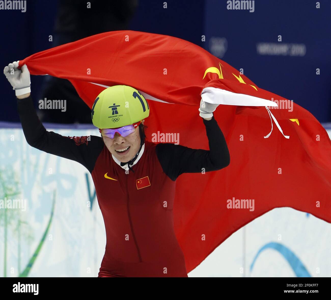 Zhou Yang of China celebrates her gold medal in the women's 1,500-meter ...