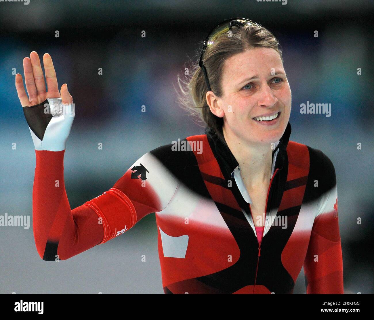 Canada's Kristina Groves waves to the crowd after competing in the ...