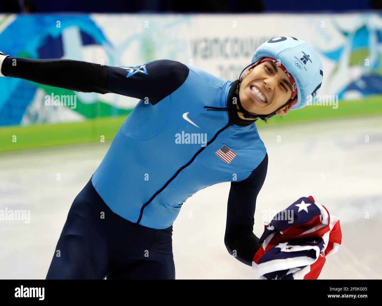 Apolo Anton Ohno of the United States mimics a slip that took him out ...