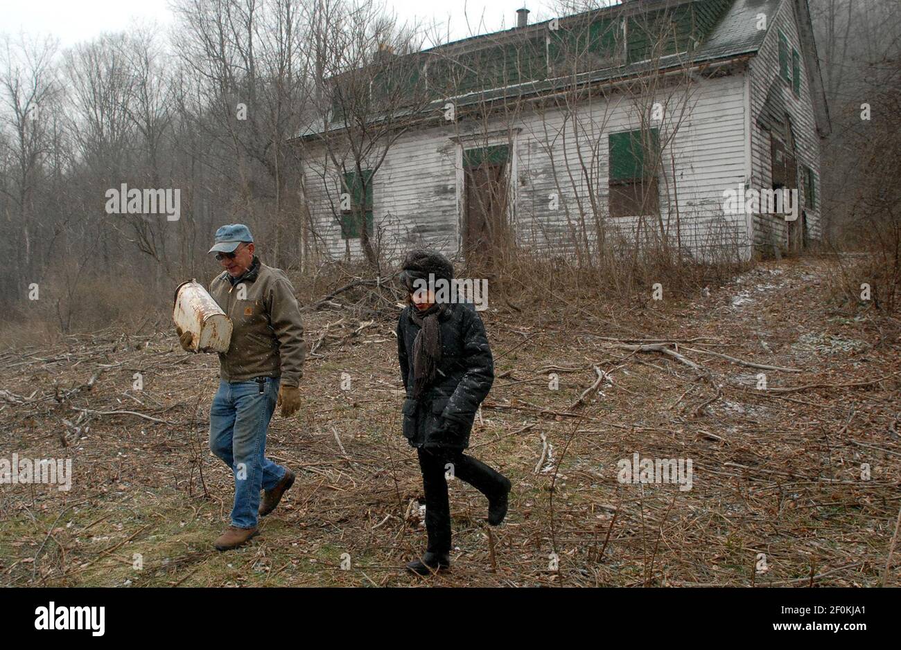At her ancestral farm, Denise Dennis strolls with caretaker John Arnone ...