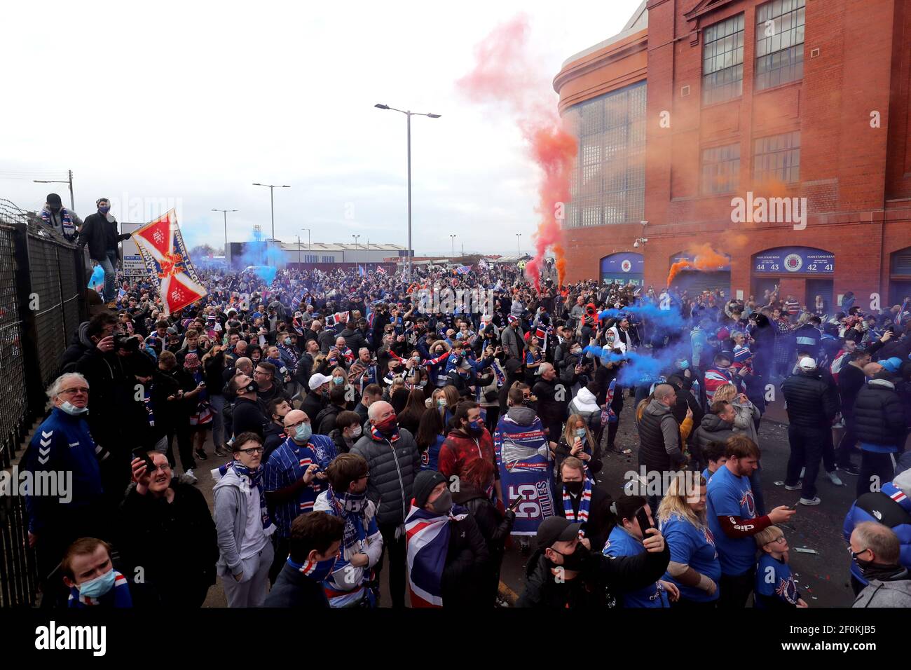 Rangers fans celebrate outside of the Ibrox Stadium after Rangers win ...