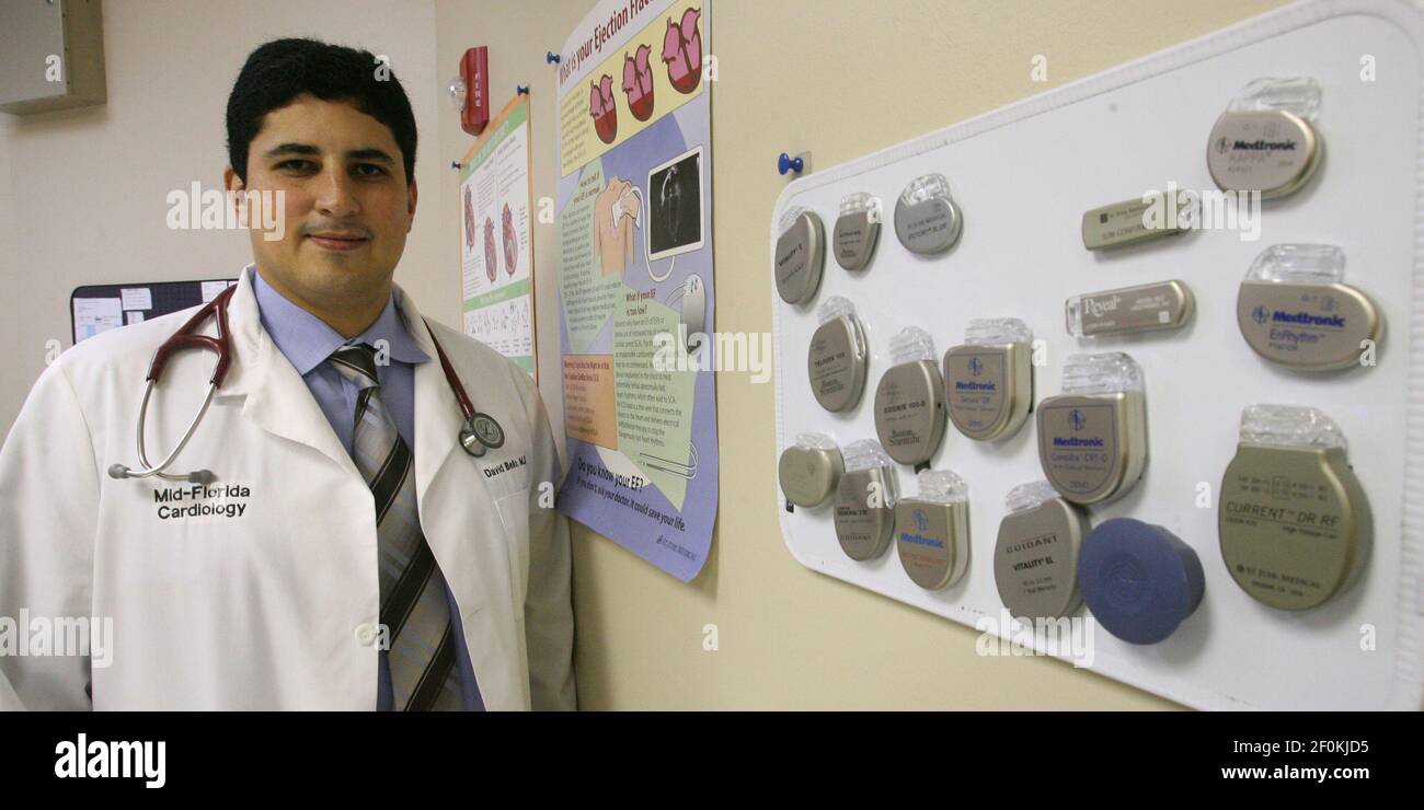 Dr. David Bello poses for portrait at his Orlando, Florida office with ...