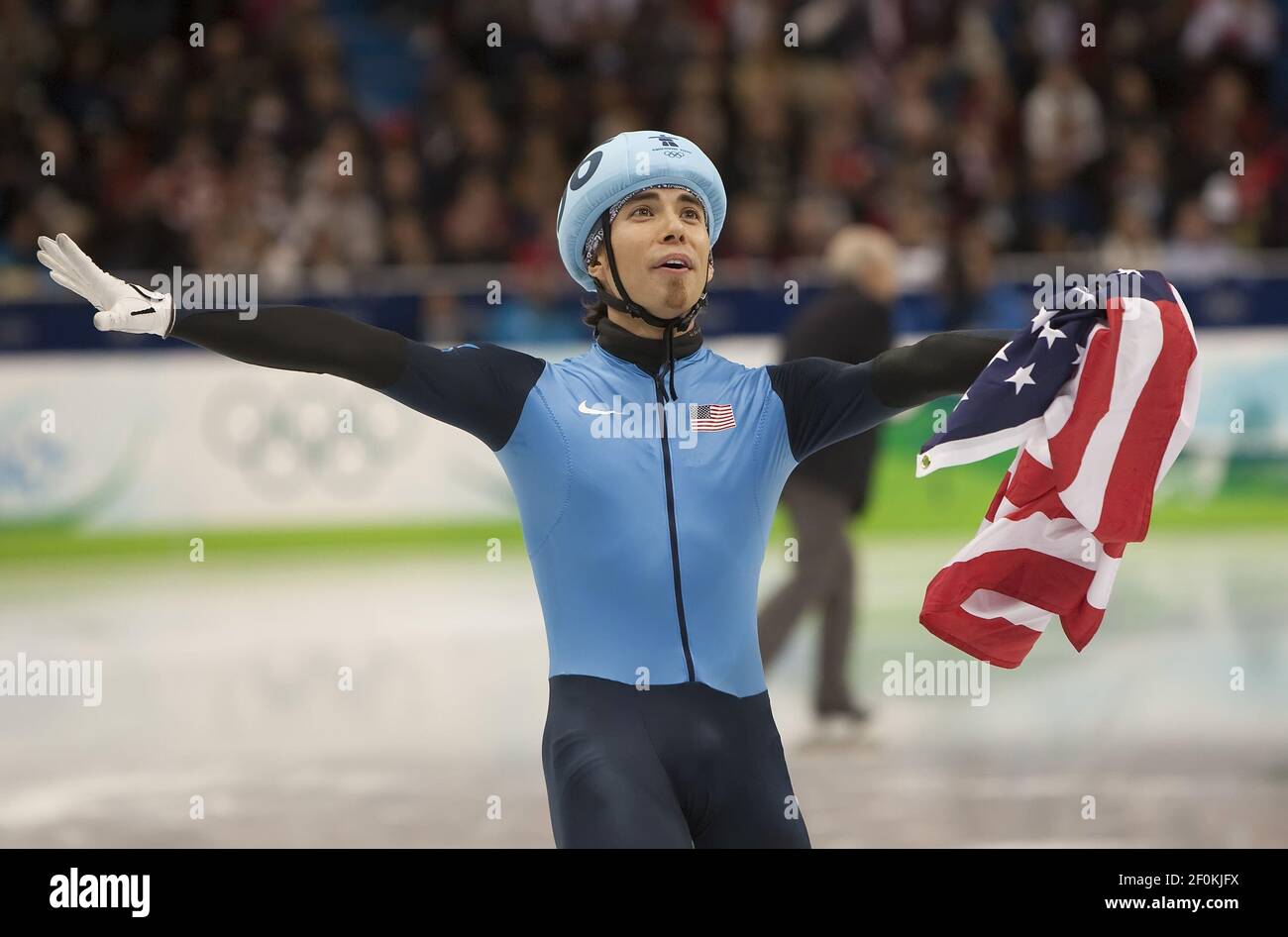 Apolo Anton Ohno of the United States celebrates winning silver in the ...