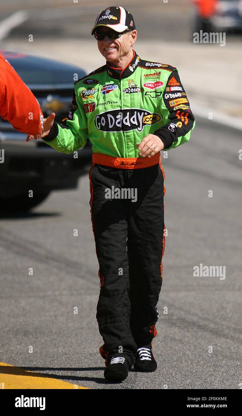 Mark Martin walks down down pit row before the start of the Daytona 500 ...