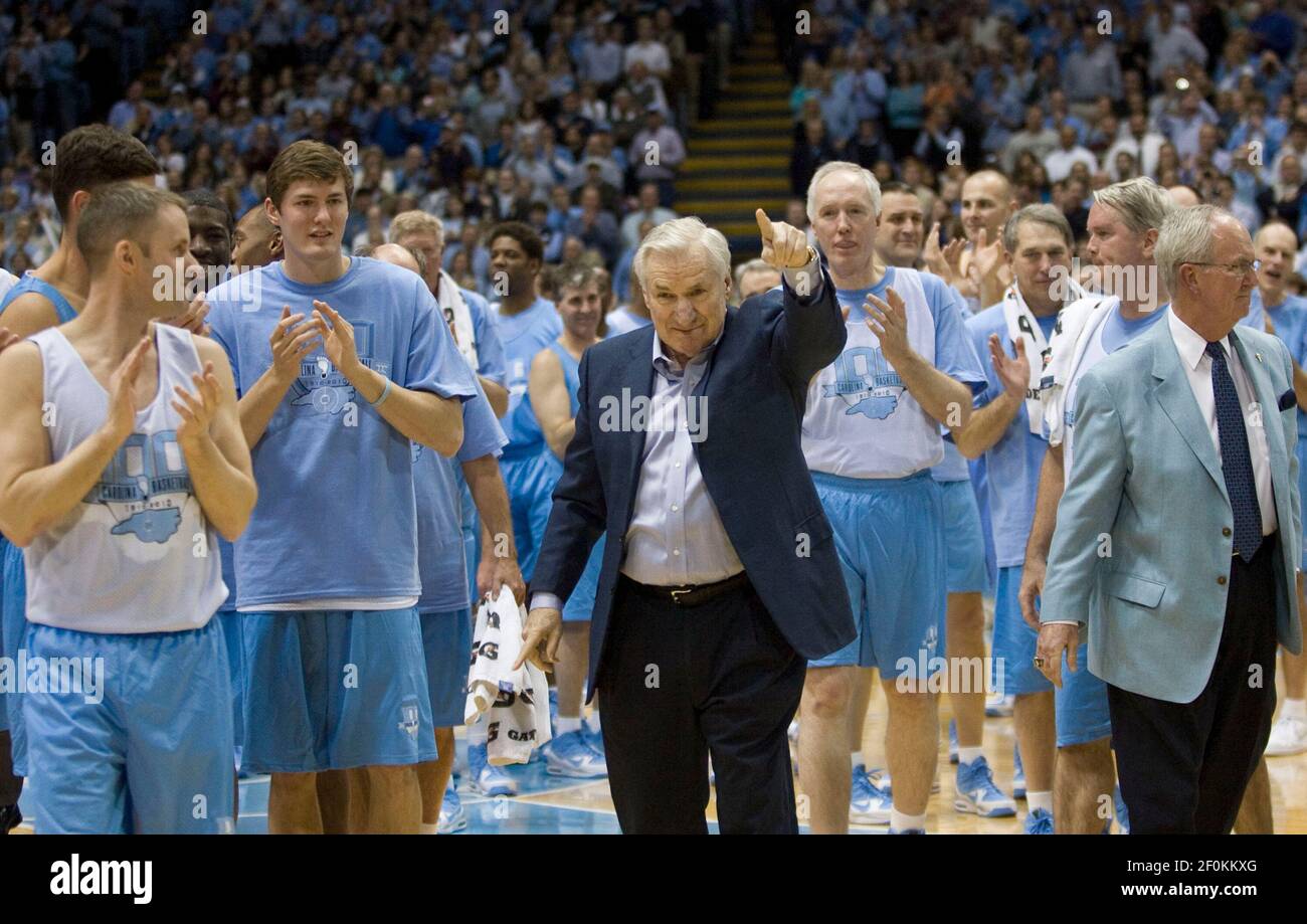 Surrounded by decades of former University of North Carolina players ...