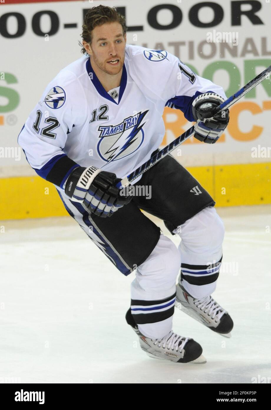 Tampa Bay Lightning left wing Ryan Malone warms up before a game ...