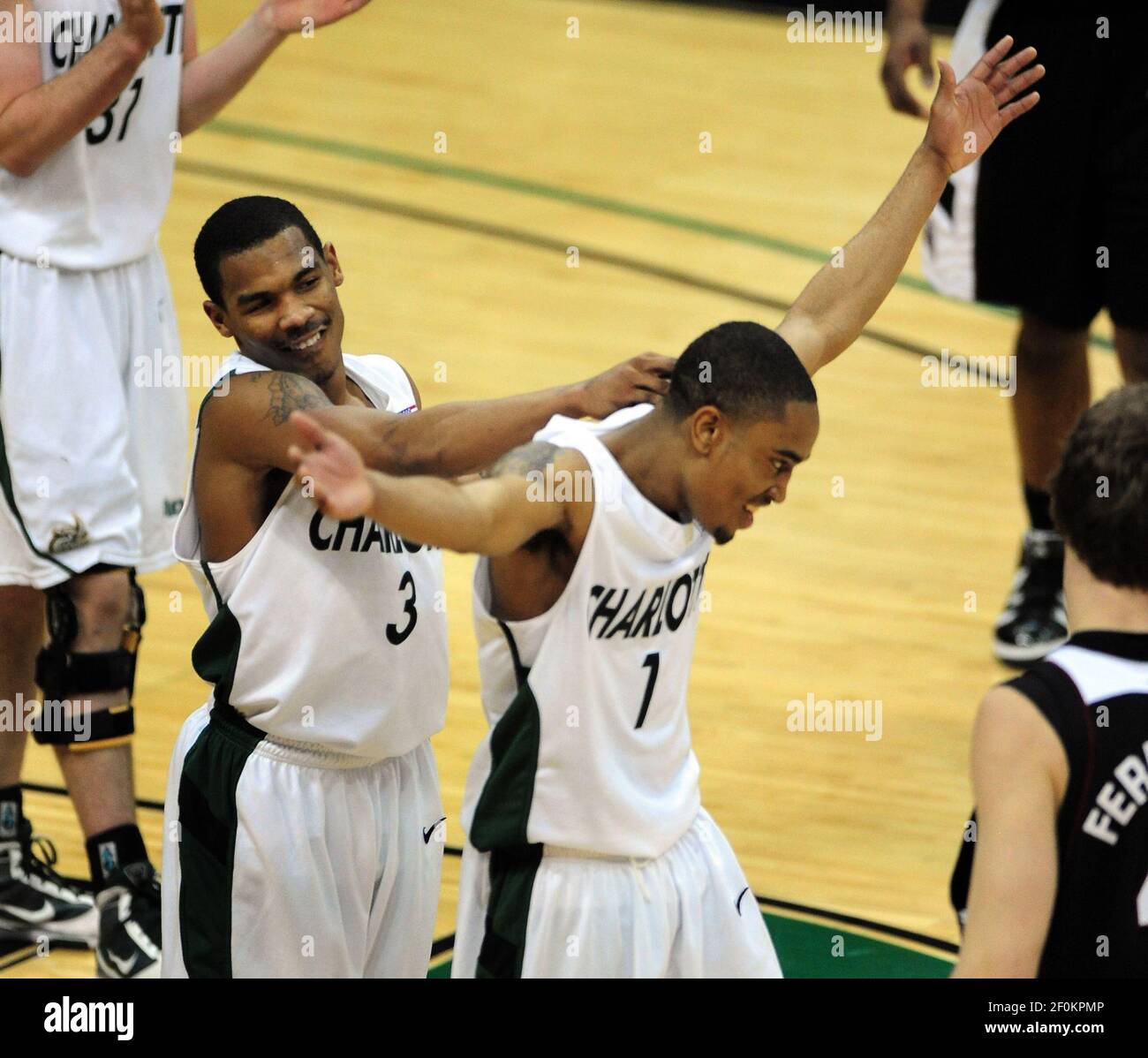 Charlotte 49ers DiJuan Harris (3) celebrates the team's play with ...