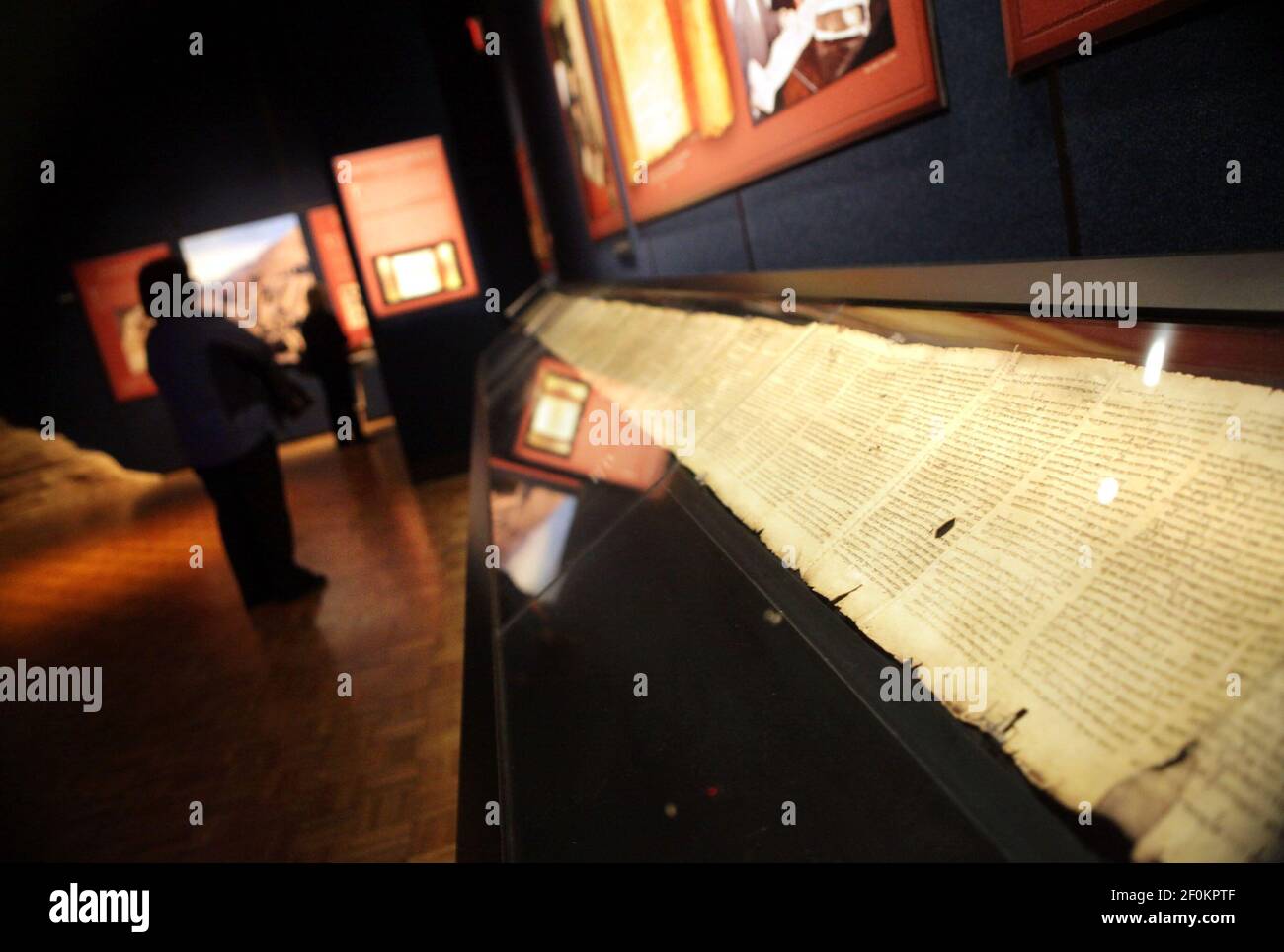 A 23-foot copy of the Isaiah scroll is on display at the "Dead Sea ...