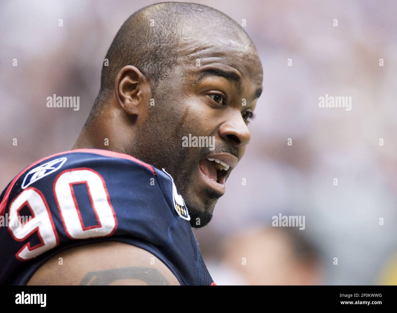 Mario Williams (90) of the Houston Texans is shown the sidelines as his ...