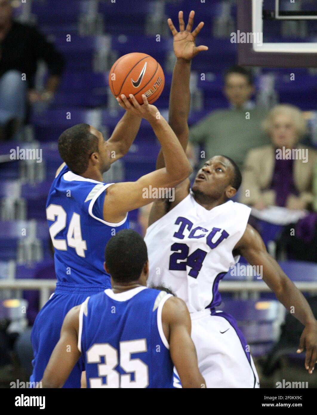 Derek Brooks (left) of Air Force tries to shoot past Kevin Butler of ...