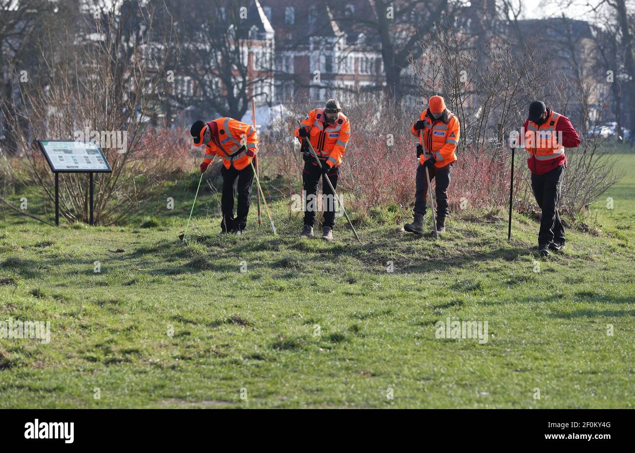 Volunteers from London Search and Rescue near Eagle Pond on Clapham ...