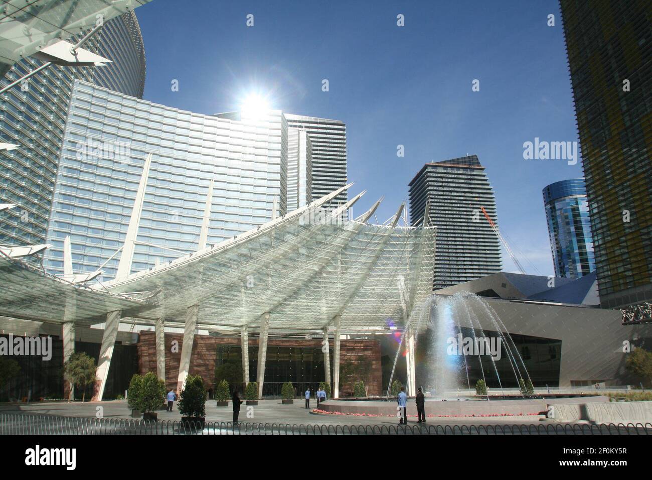 A sweeping canopy with a fountain out front highlights the entrance to ...