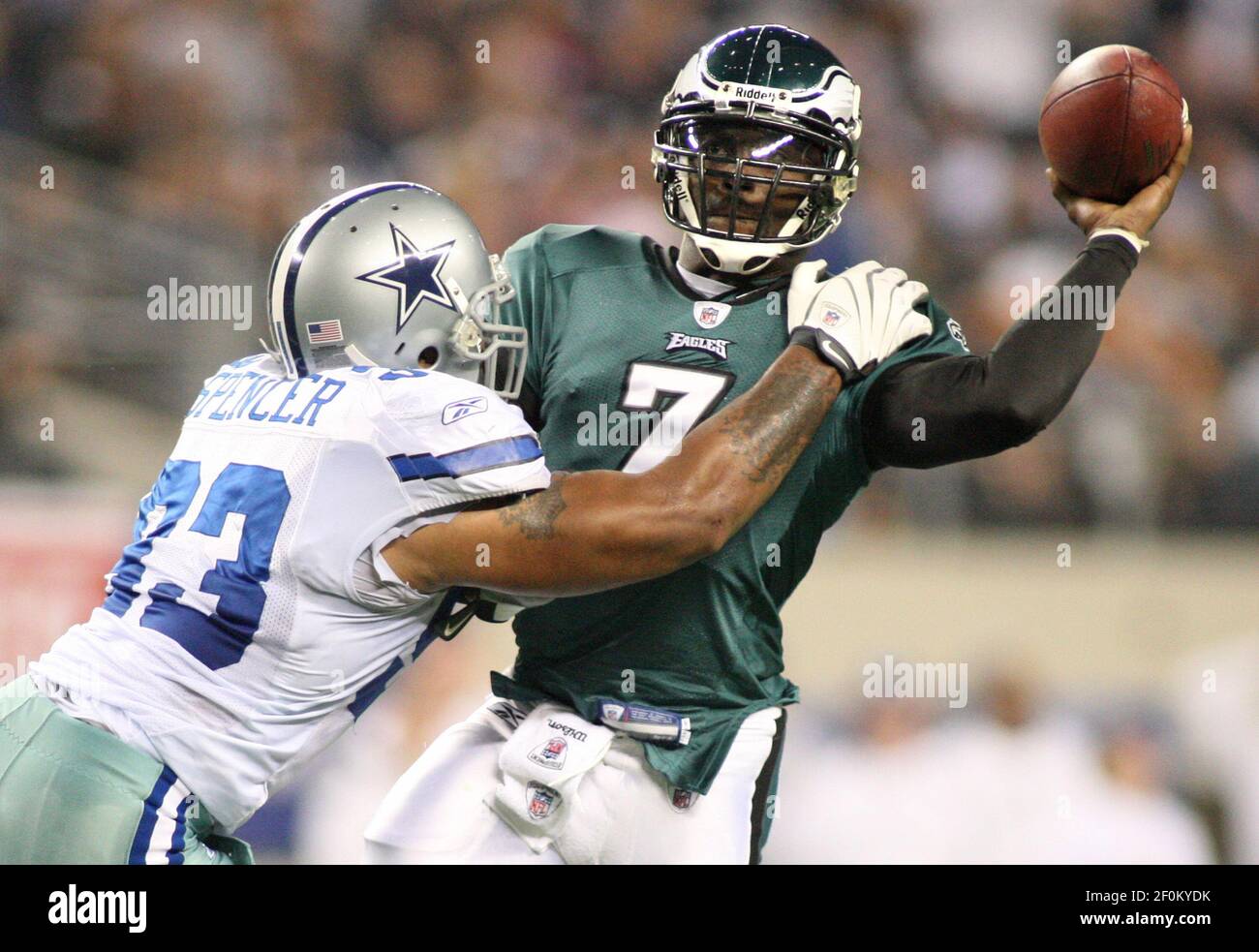 The Dallas Cowboys' Anthony Spencer, left, pressures Philadelphia ...