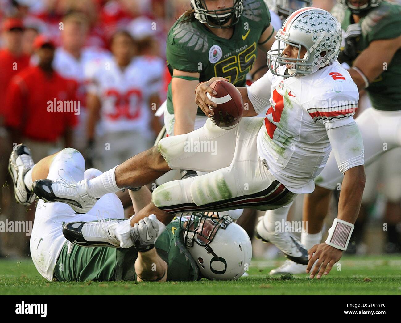 Oregon defensive tackle Blake Ferras, left, tackles Ohio state ...