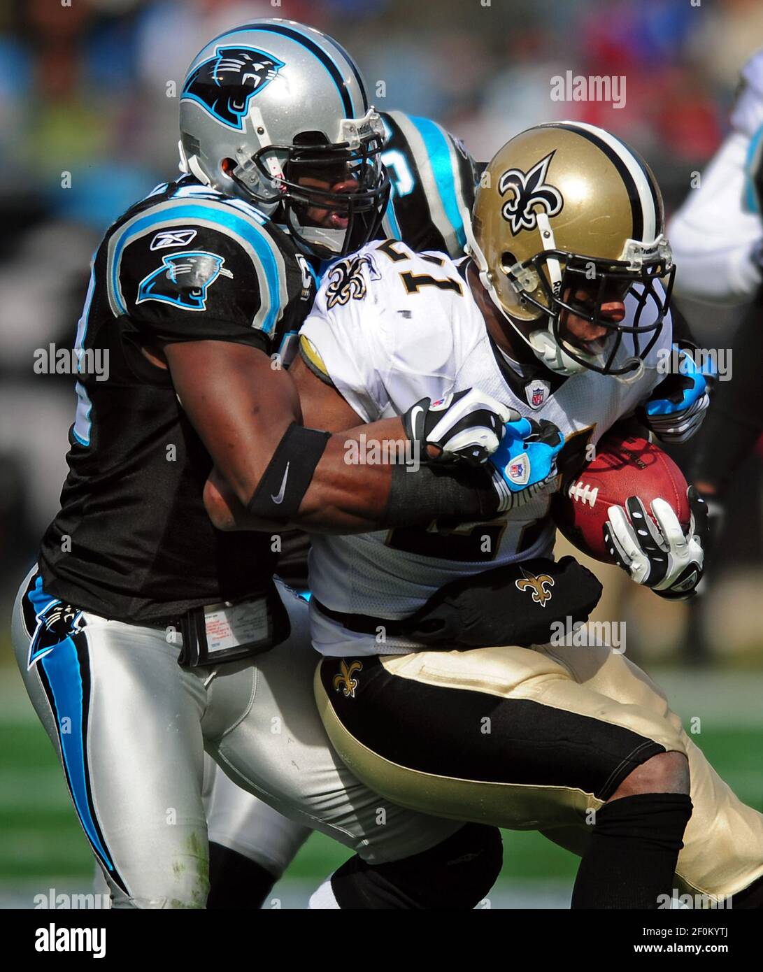Carolina Panthers linebacker Jon Beason (52) tackles New Orleans Saints ...