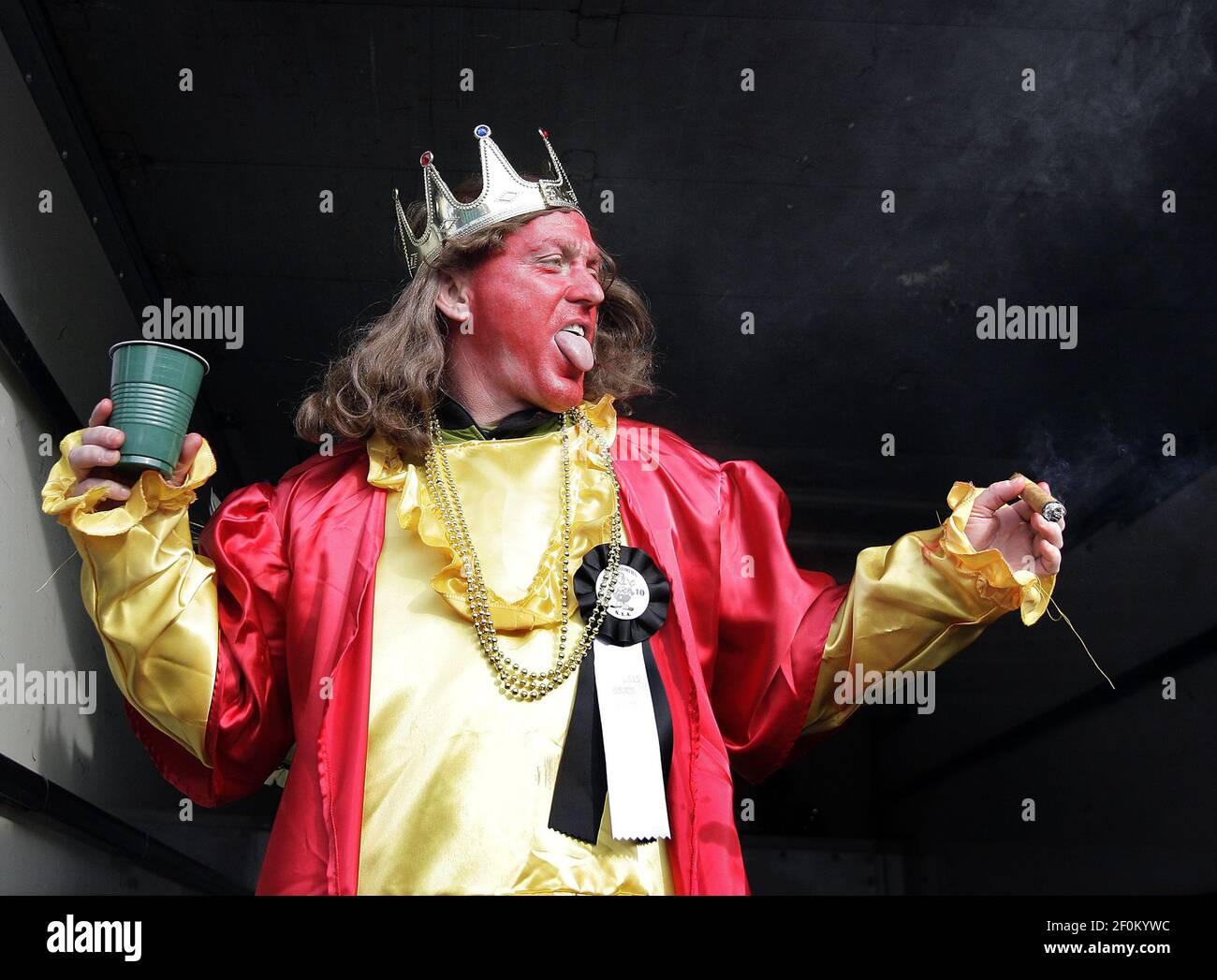 Bobby Labrum, of Jolly Jolly Comics, plays to the crowd along Broad ...