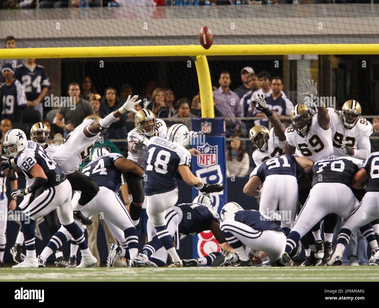Dallas Cowboys place kicker David Buehler (18) kicks a 2nd-quarter ...