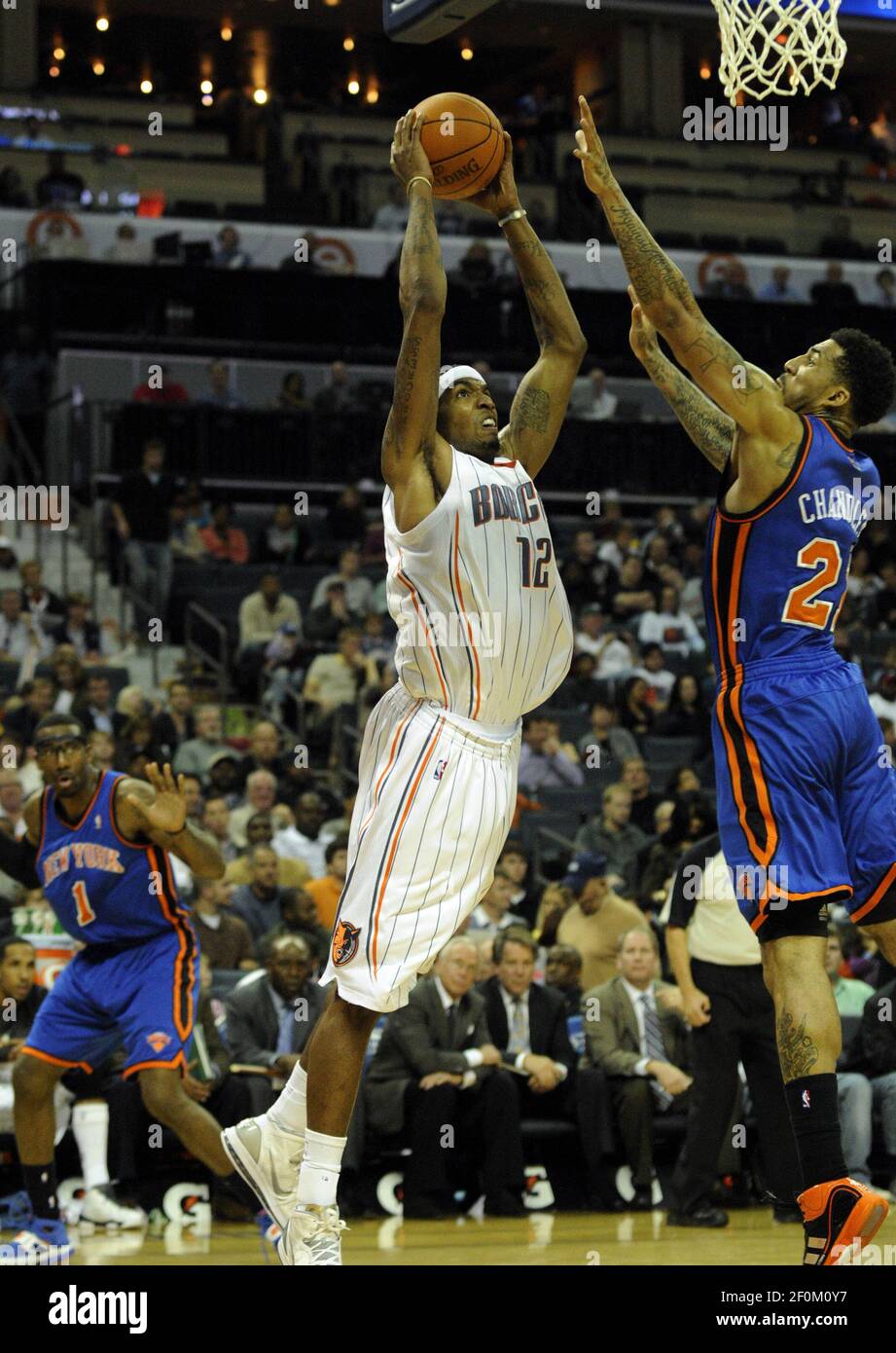 Charlotte Bobcats' Tyrus Thomas (12) drives the baseline past New York ...
