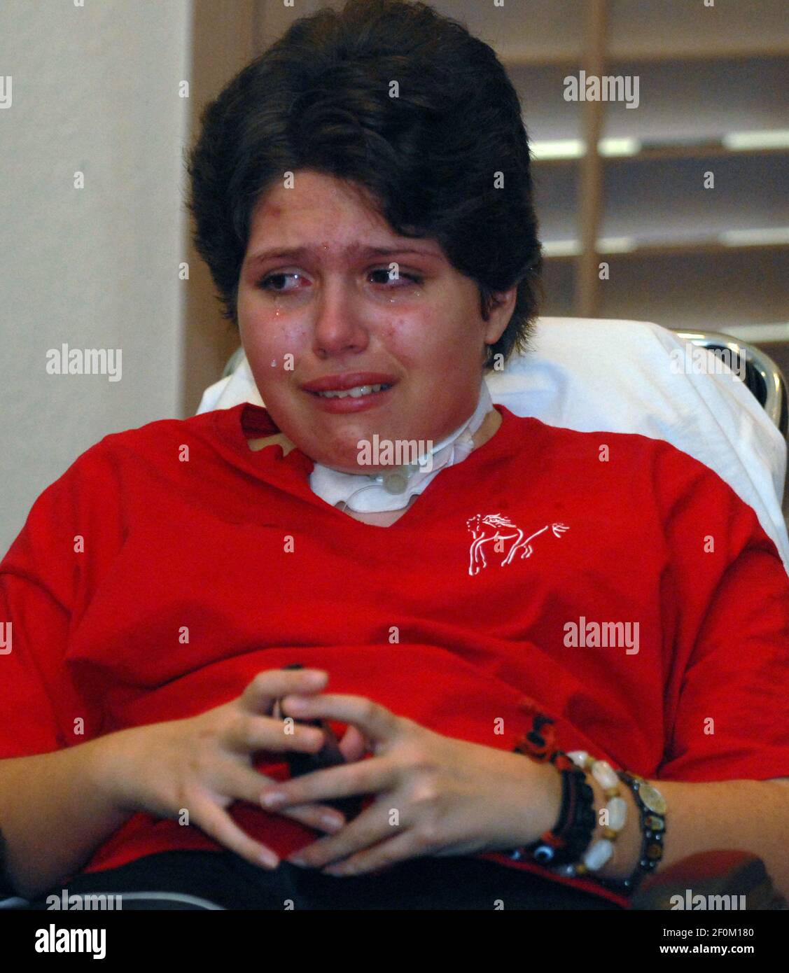 Teagan Marti makes an emotional appearance at a press conference with ...