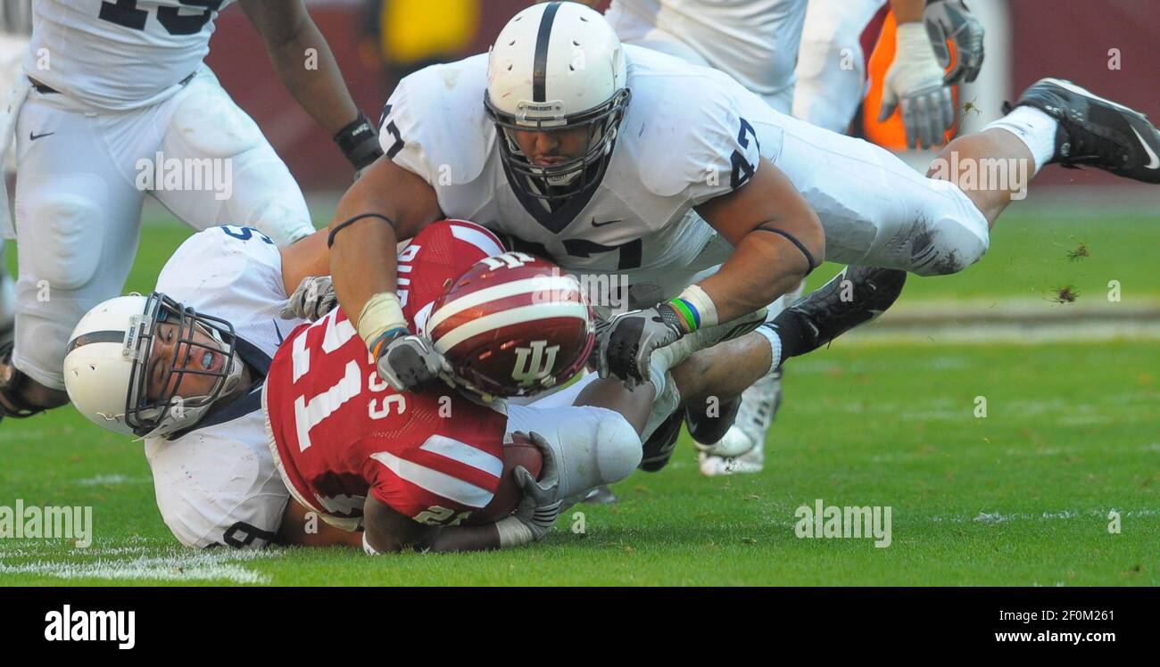 Indiana running back Trea Burgess is taken down by Penn State defenders ...