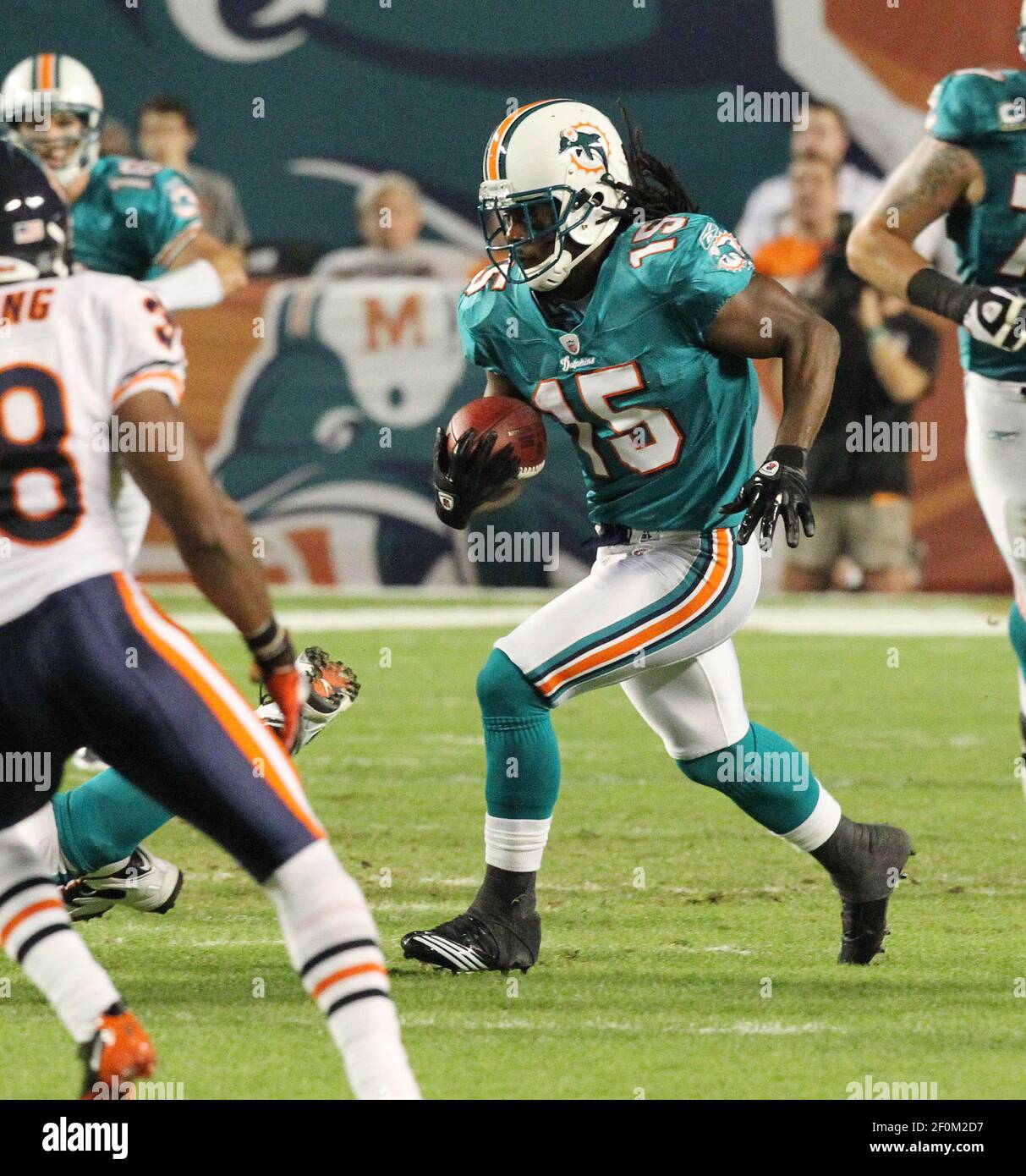 Miami Dolphins wide receiver Davone Bess runs for a first down in the ...