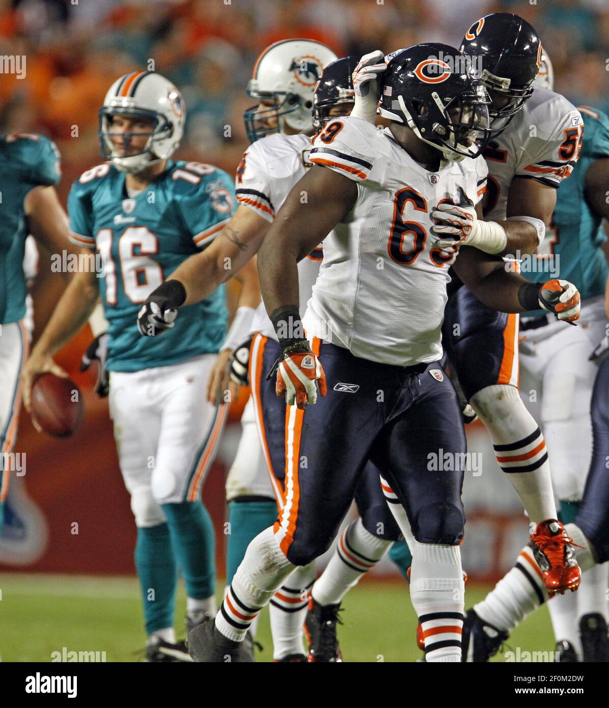 Miami Dolphins quarterback Tyler Thigpen (16) is sacked in the second ...