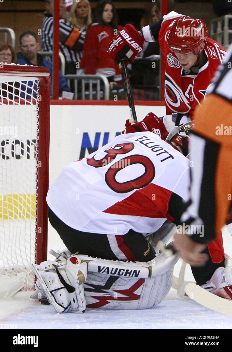 The Carolina Hurricanes' Eric Staal (12) pushes the puck through the ...