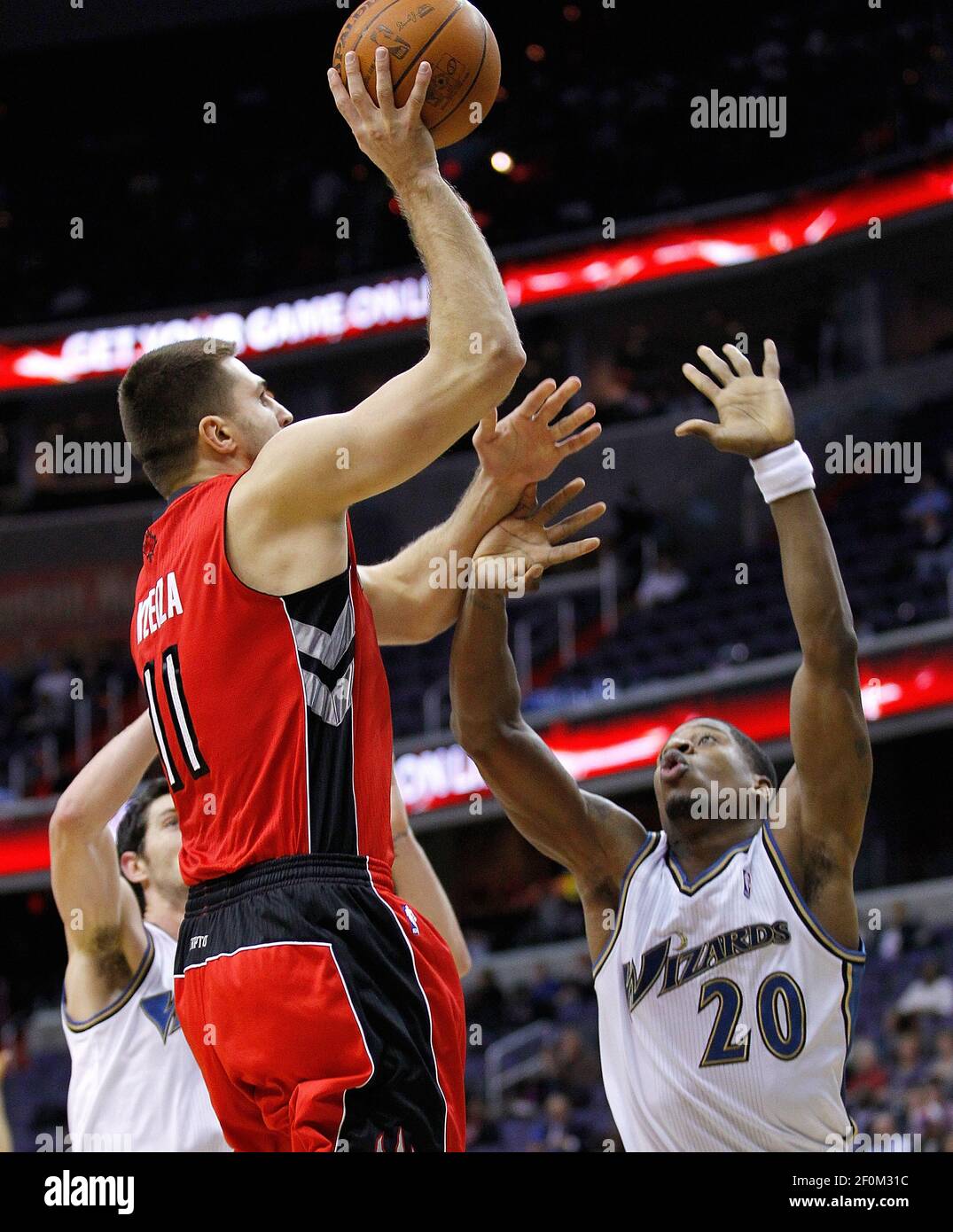 Toronto Raptors small forward Linas Kleiza (11) shoots over Washington ...
