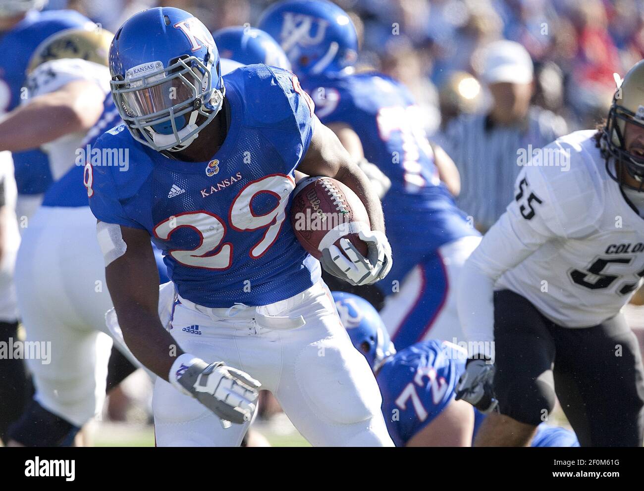 Kansas running back James Sims looks for running room in the first ...