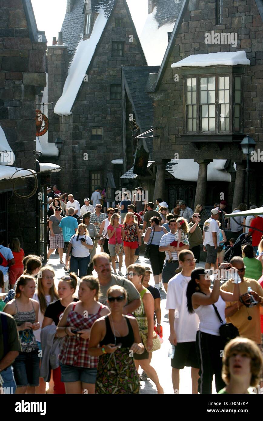 Guests check out the snow-capped Hogsmeade Village at the Wizarding ...