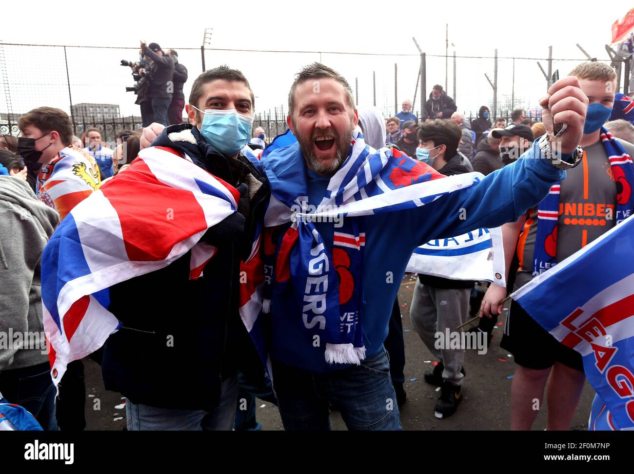 Rangers fans celebrate outside of the Ibrox Stadium after Rangers win ...