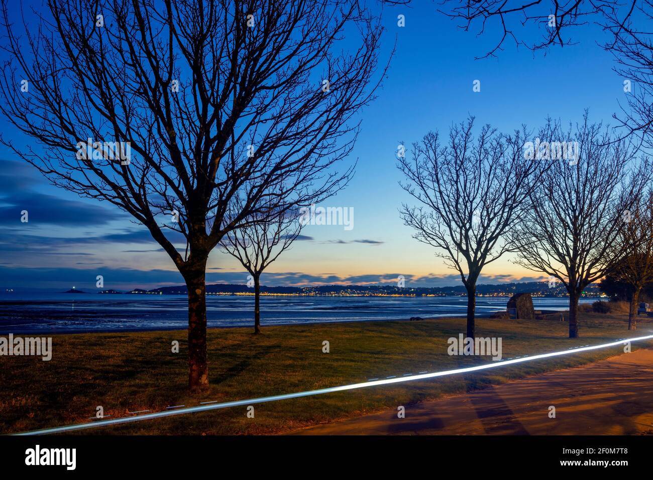 Swansea seafront promenade with view of Mumbles Stock Photo - Alamy