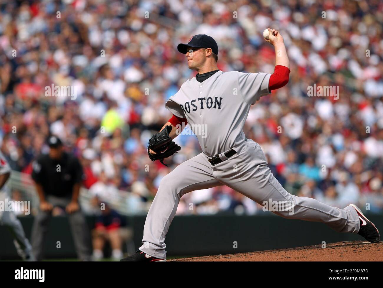 Boston Red Sox pitcher Jon Lester throws against the Minnesota Twins ...