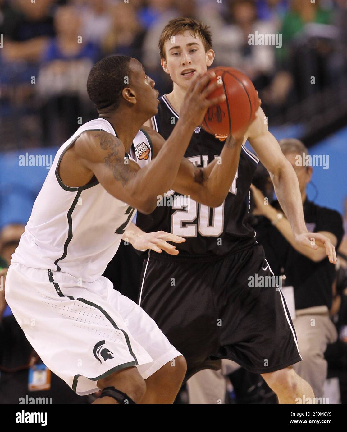 Raymar Morgan of Michigan State (2) looks to put up the ball against ...