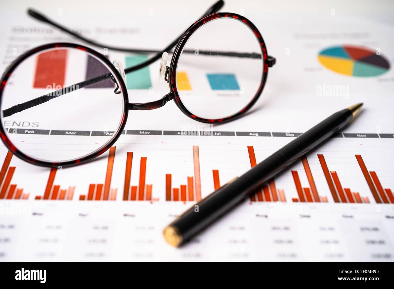 Eyeglass on graph paper background Stock Photo - Alamy