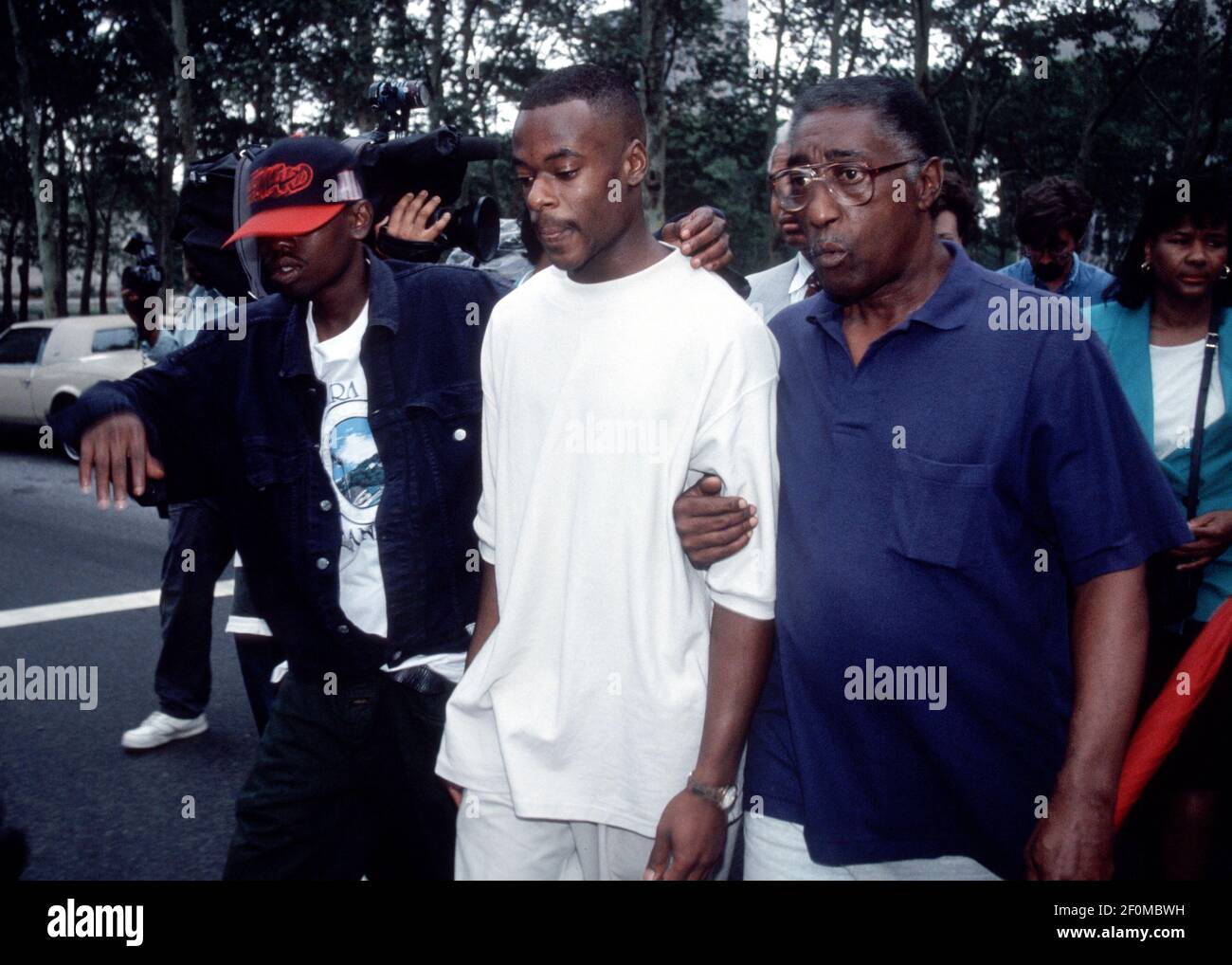 Lemrick Nelson (C) aided by supporters leaves Brooklyn Federal court in ...