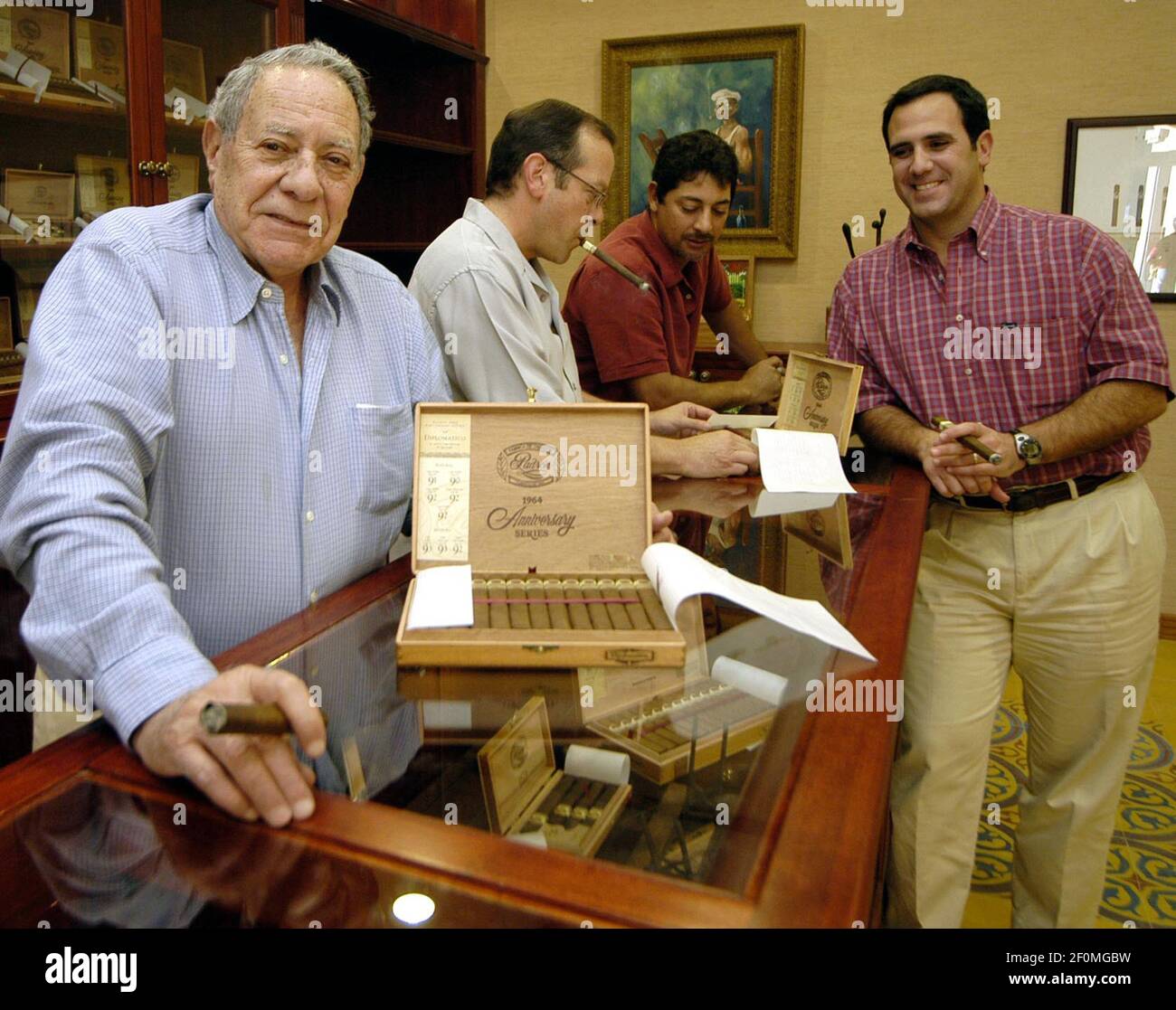 Jose O. Padron at his new offices in Miami with his family, from left ...