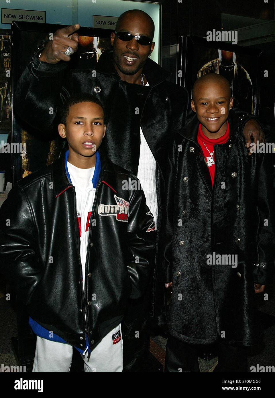 DMX poses for pictures with his son (right, Xavier) and godson (left ...