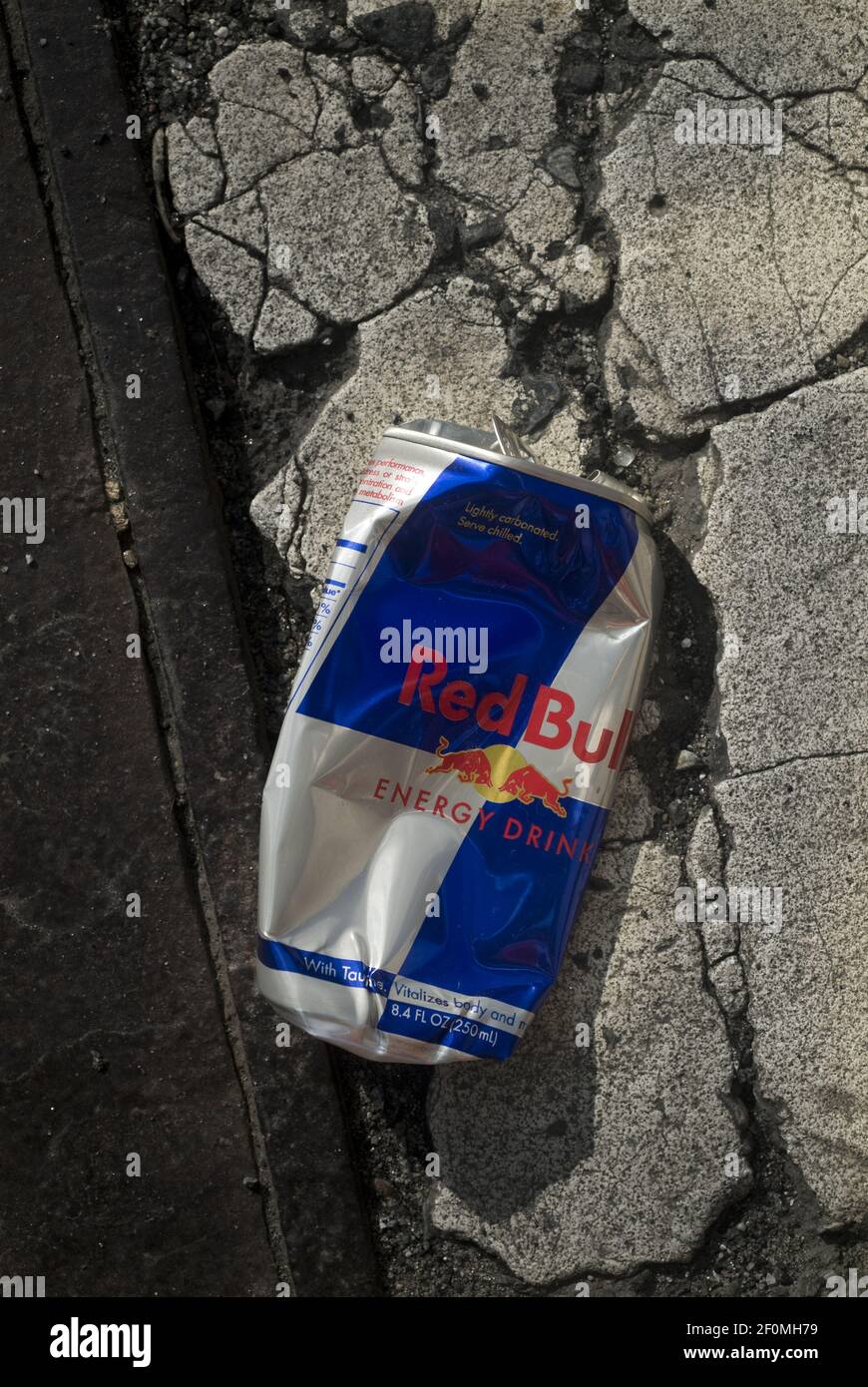 A crushed aluminum can of Red Bull energy drink seen in New York on ...