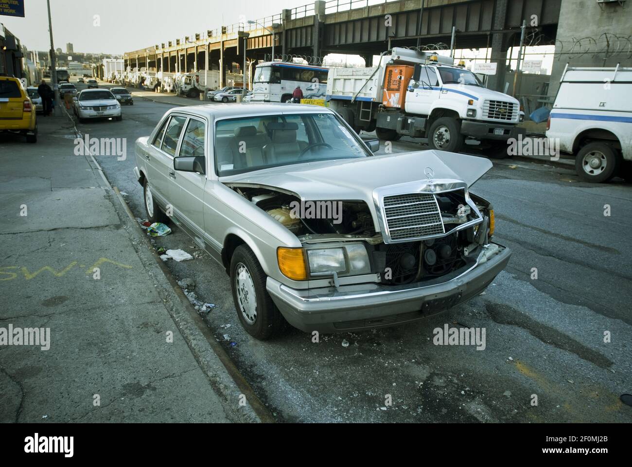 Accident damaged Mercedes-Benz outside an auto repair shop in New York ...
